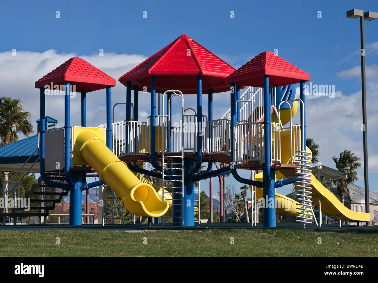 Clean, modern public park playground in the Southwestern United States ...