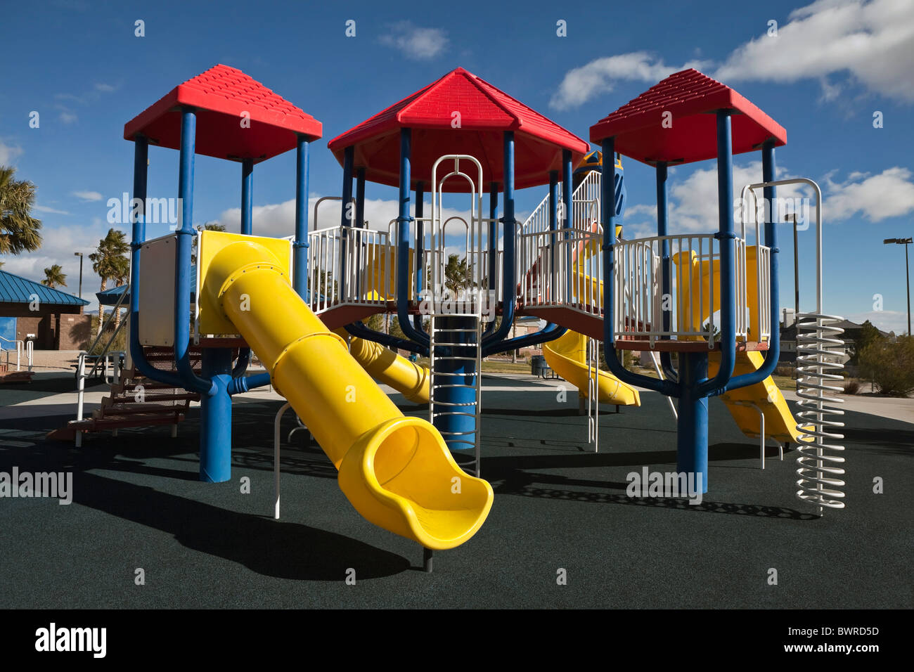 Clean, modern public park playground in the Southwestern United States ...