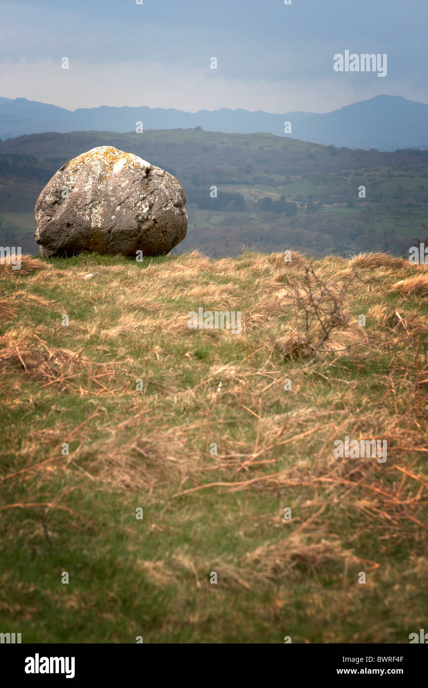 Big boulder perched on the brow of a hill near the village of Cartmel ...