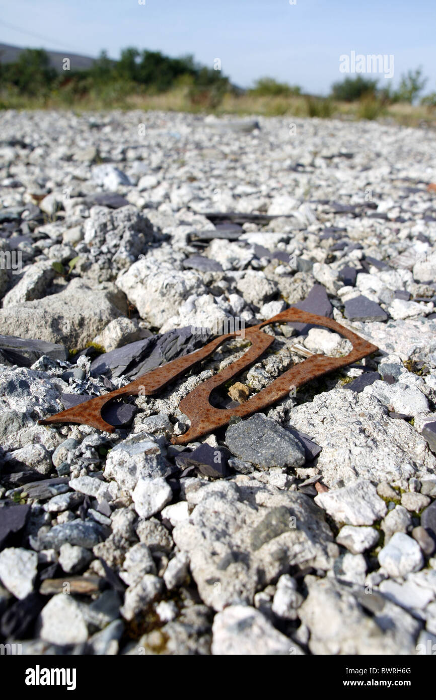 piece of metal on the grounds of a derelict demolished factory unit ...