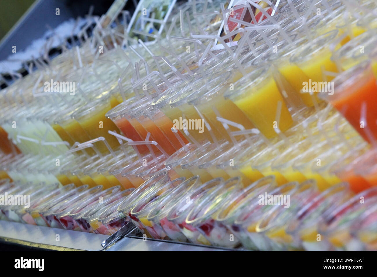 A display of fruit juices for sale at Borough Market, London Bridge ...