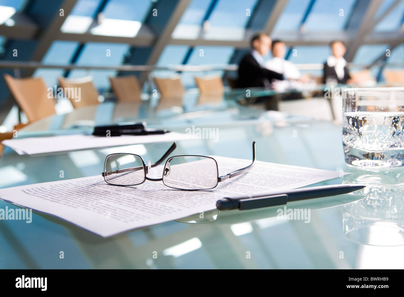 Image of several objects lying on the table in the conference room ...