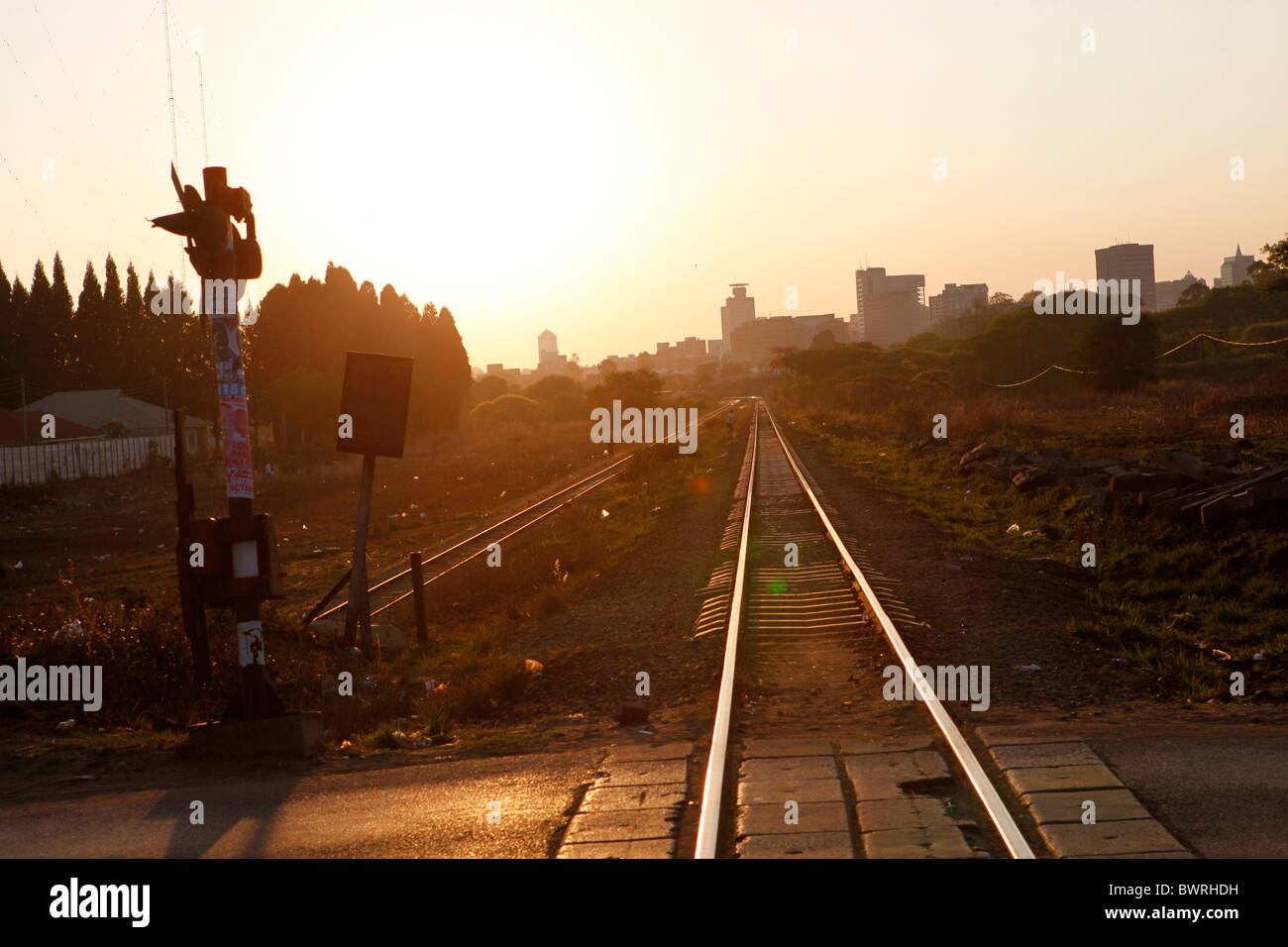 Sunset over the railway lines that lead into Harare, Zimbabwe Stock ...