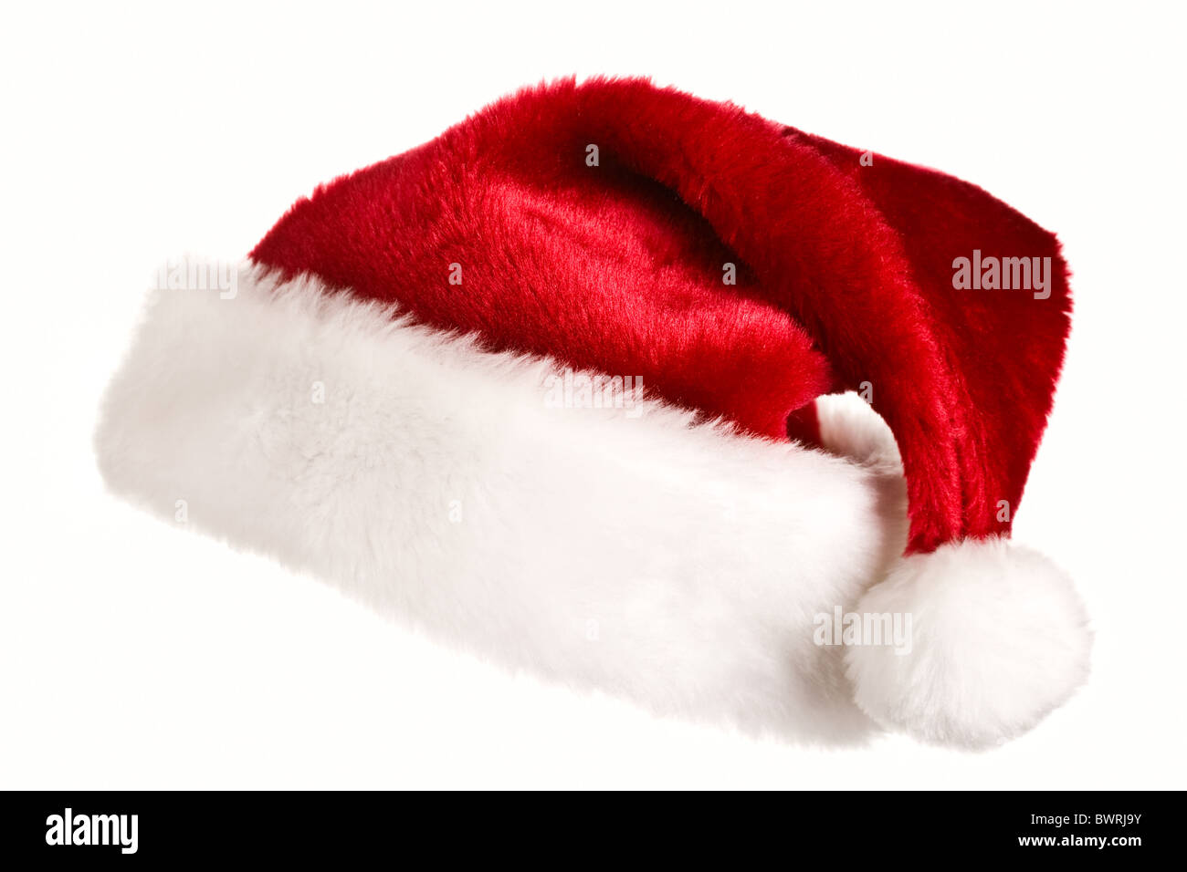 Santa's red hat isolated on white Stock Photo - Alamy