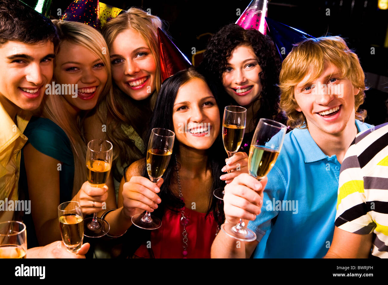 Portrait of happy friends with champagne at birthday party Stock Photo ...