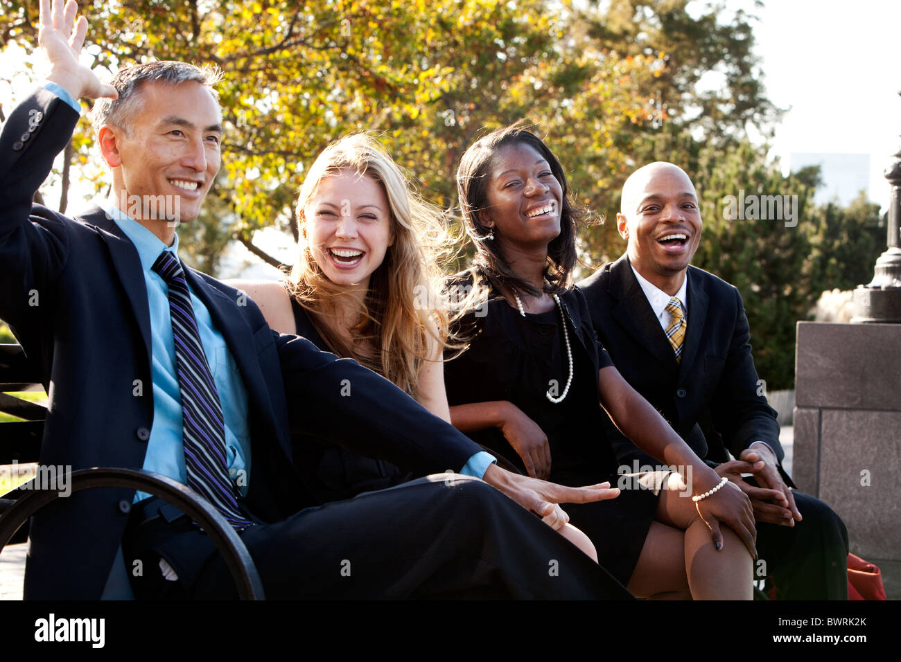 A group of business people having fun and joking Stock Photo - Alamy