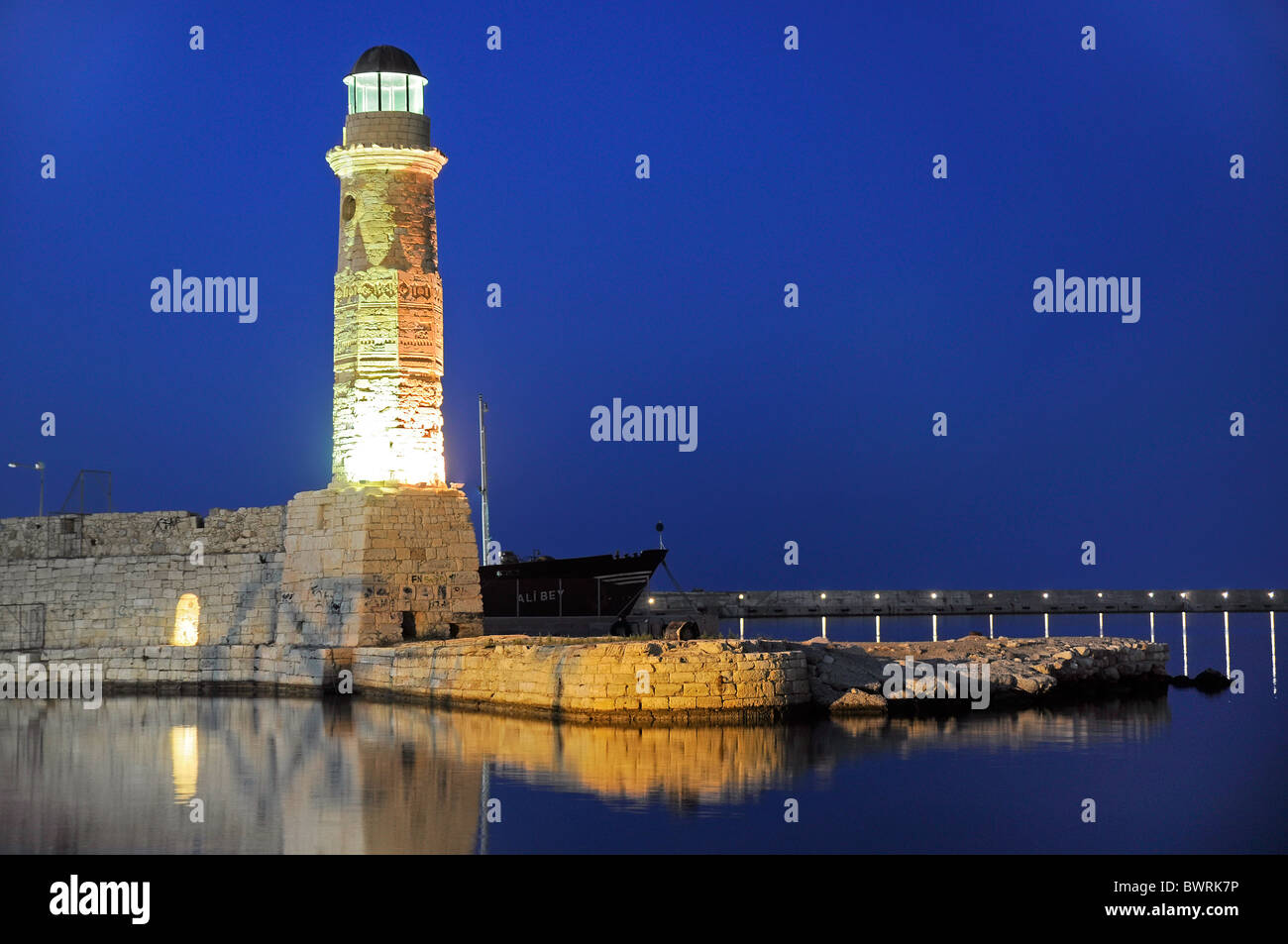 Lighthouse in the night in Rethymno port, Crete Stock Photo - Alamy