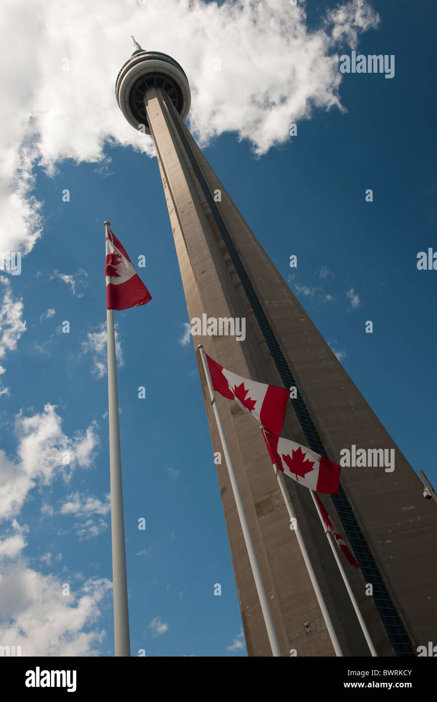 CN Tower with Canadian flags and blue sky Stock Photo - Alamy