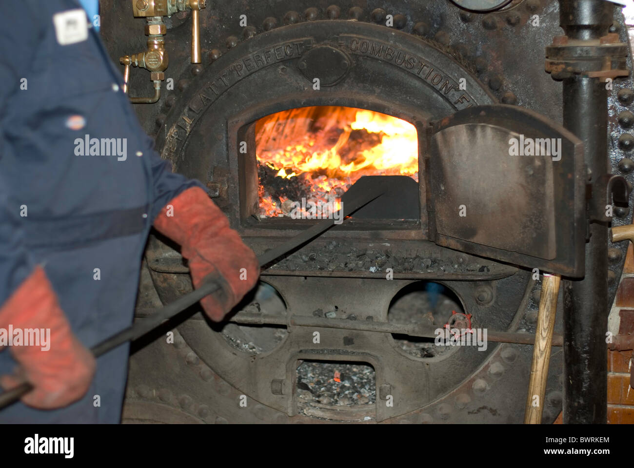 Stoking the boilers at Papplewick pumping station Stock Photo - Alamy
