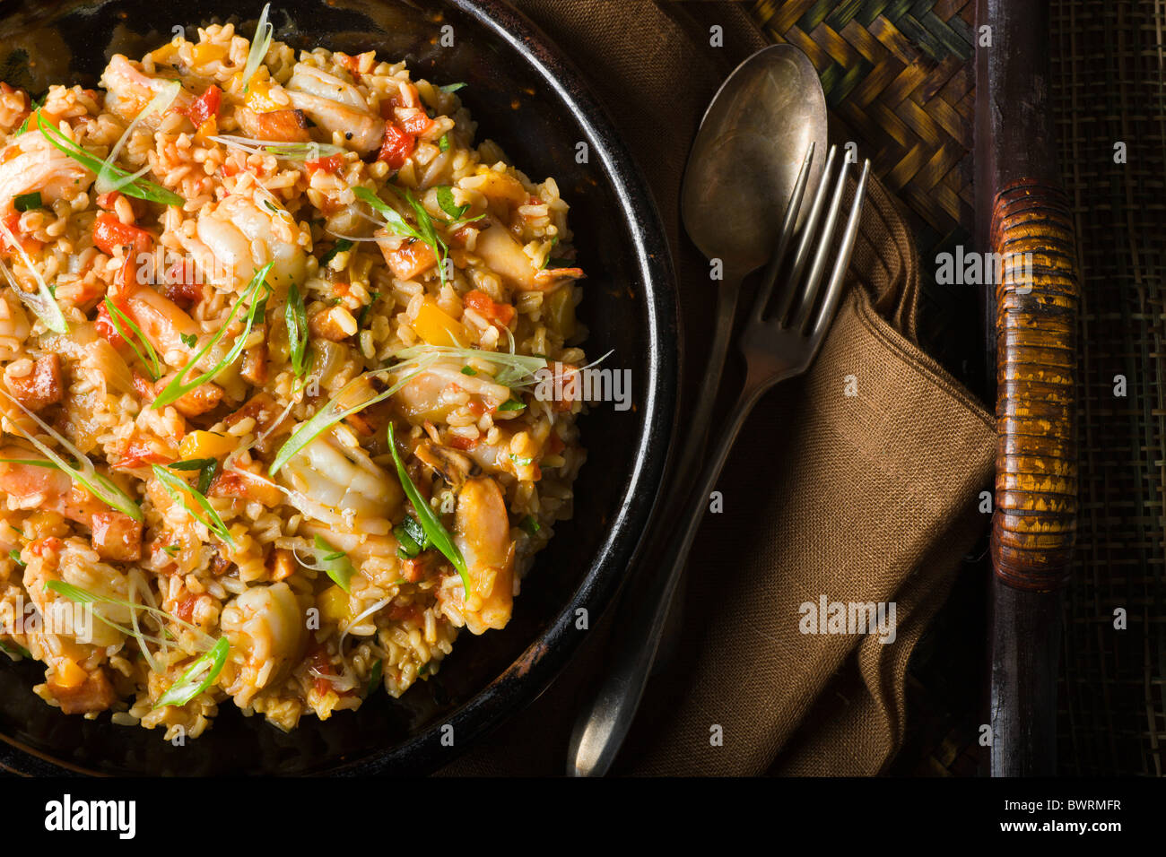 Brown Rice with Bell Peppers, Tomatoes, Ham and Shrimp Stock Photo - Alamy