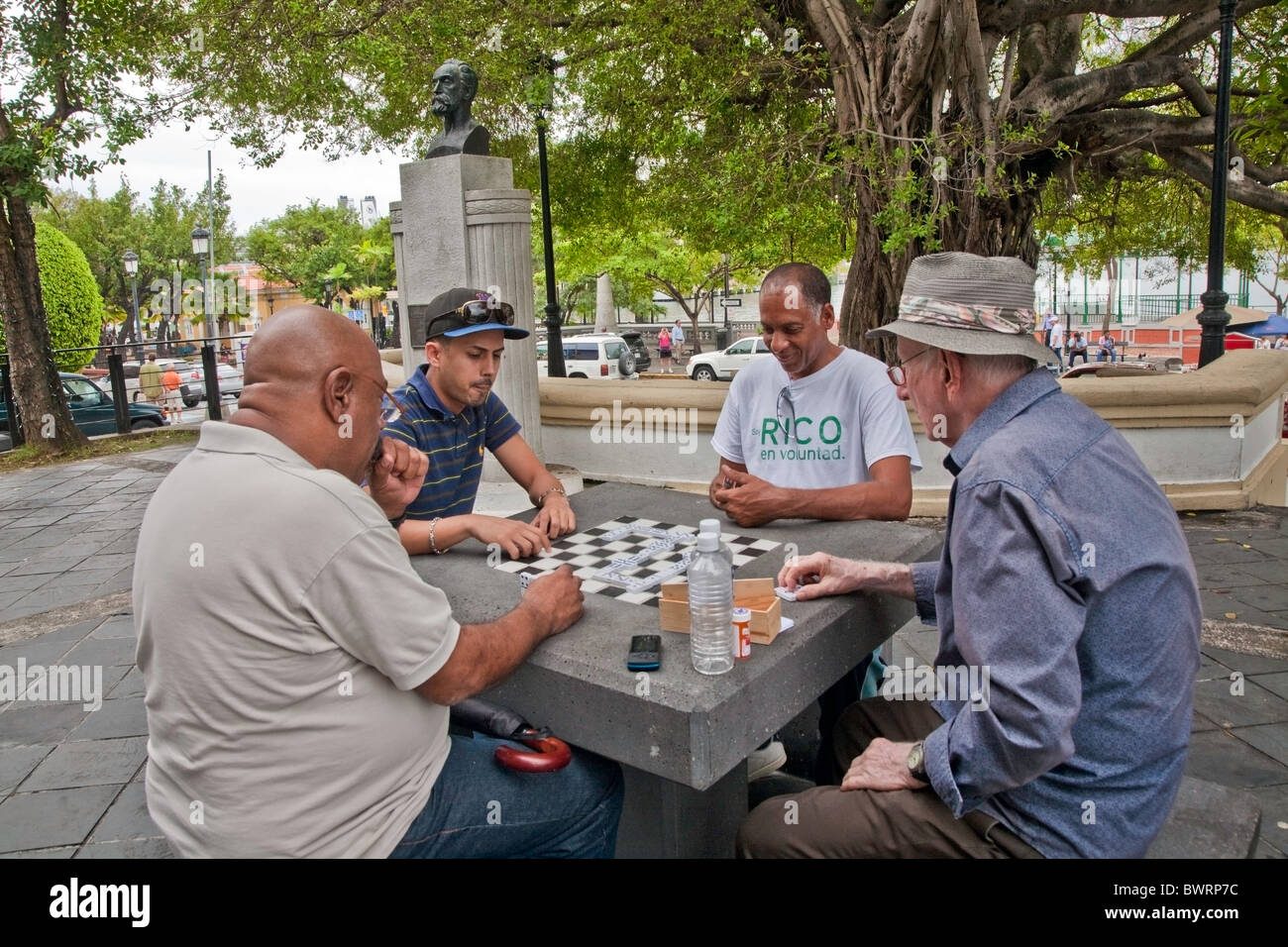Four Men play Domino in a park in San Juan;Puerto Rico Stock Photo - Alamy