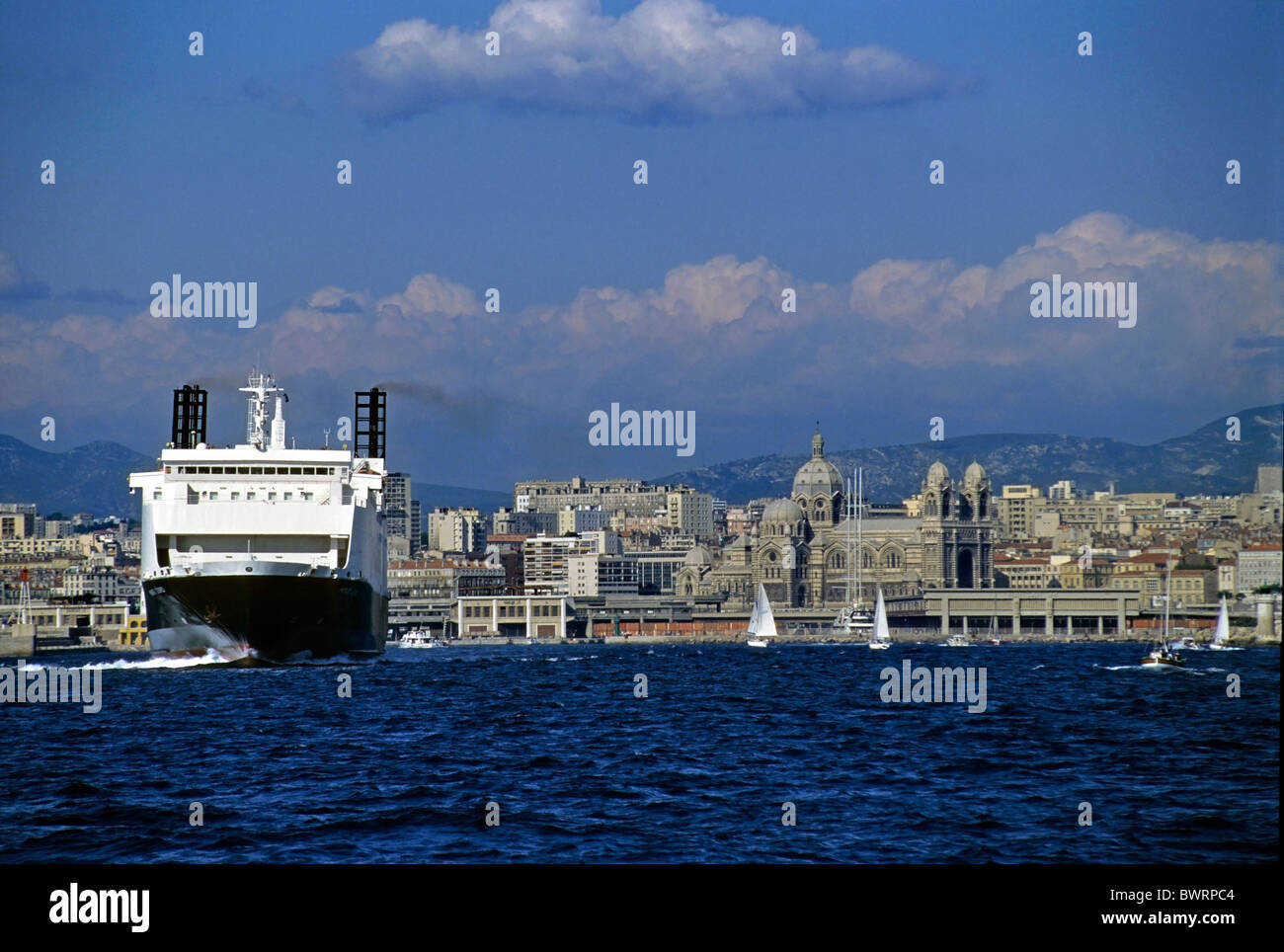 Large ferry boat entering the Marseille port, with the Marseille ...
