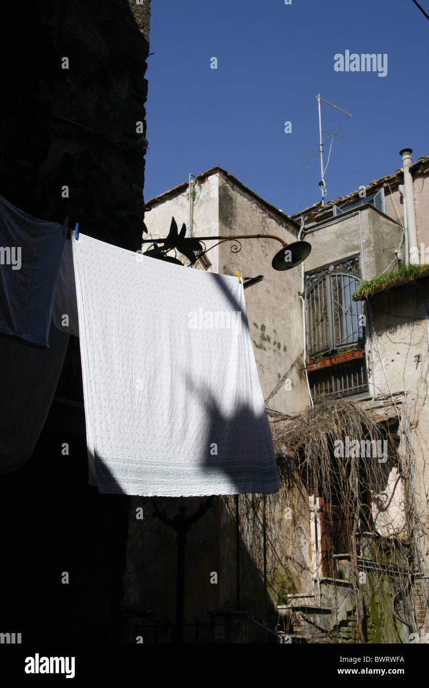 bed sheets on washing line outdoors in sun in italy Stock Photo - Alamy