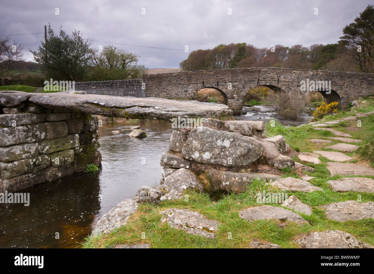 The famous clapper bridge in the Dartmoor village of Postbridge in ...