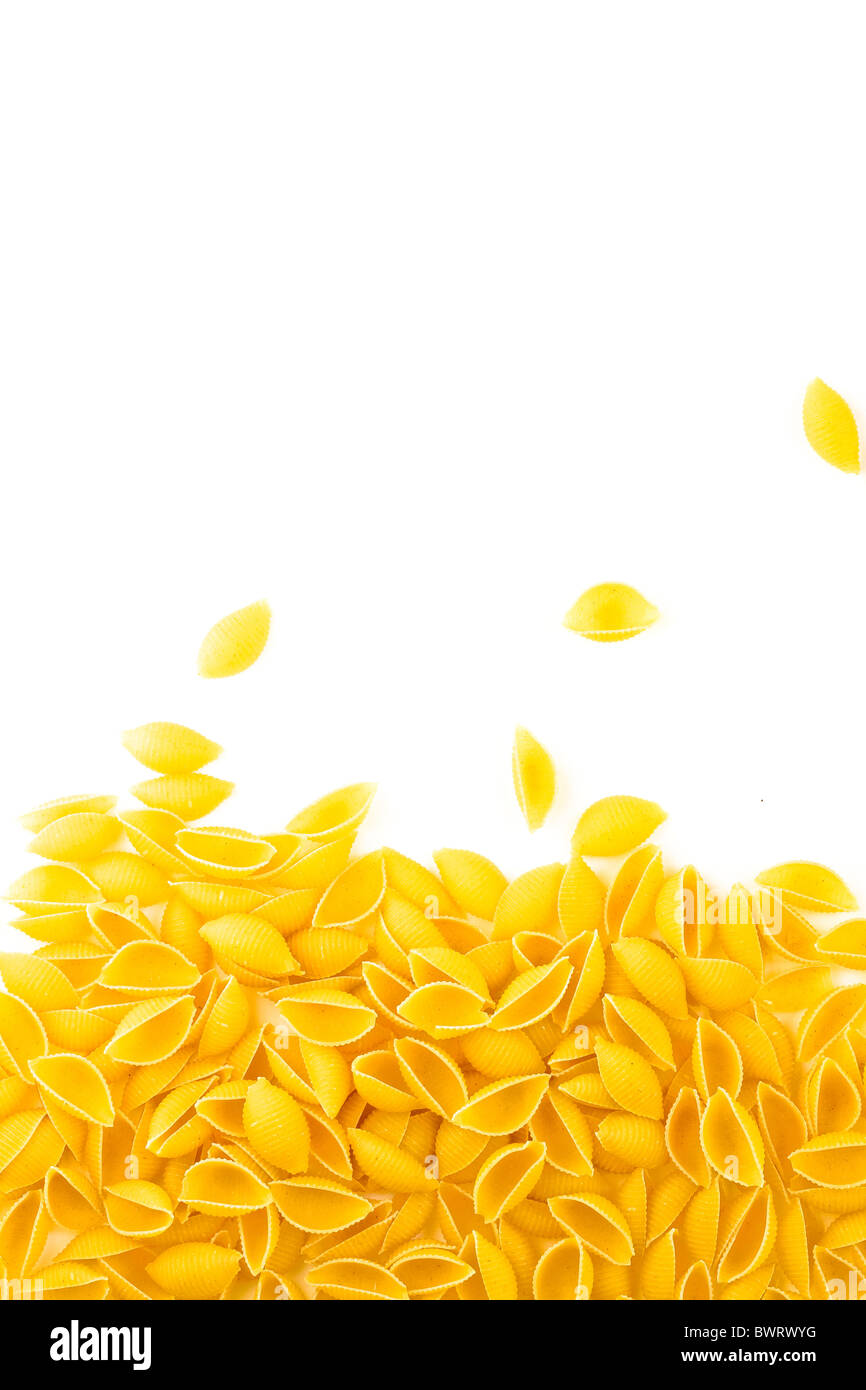 Delicious shell pasta isolated on white background with copy space ...