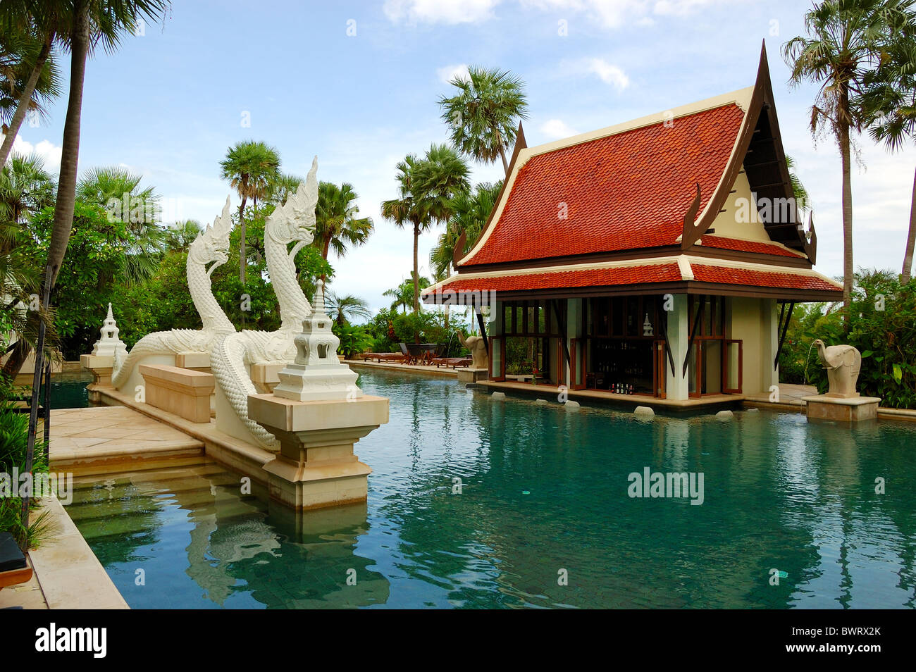 Swimming pool and bar in traditional Thai style at the luxury hotel ...