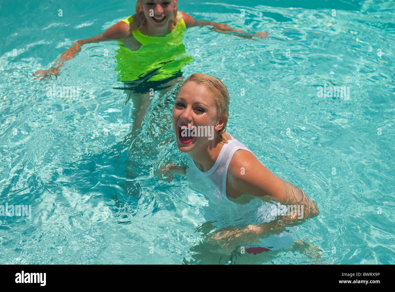 Wet clothes swimming pool hi-res stock photography and images - Alamy