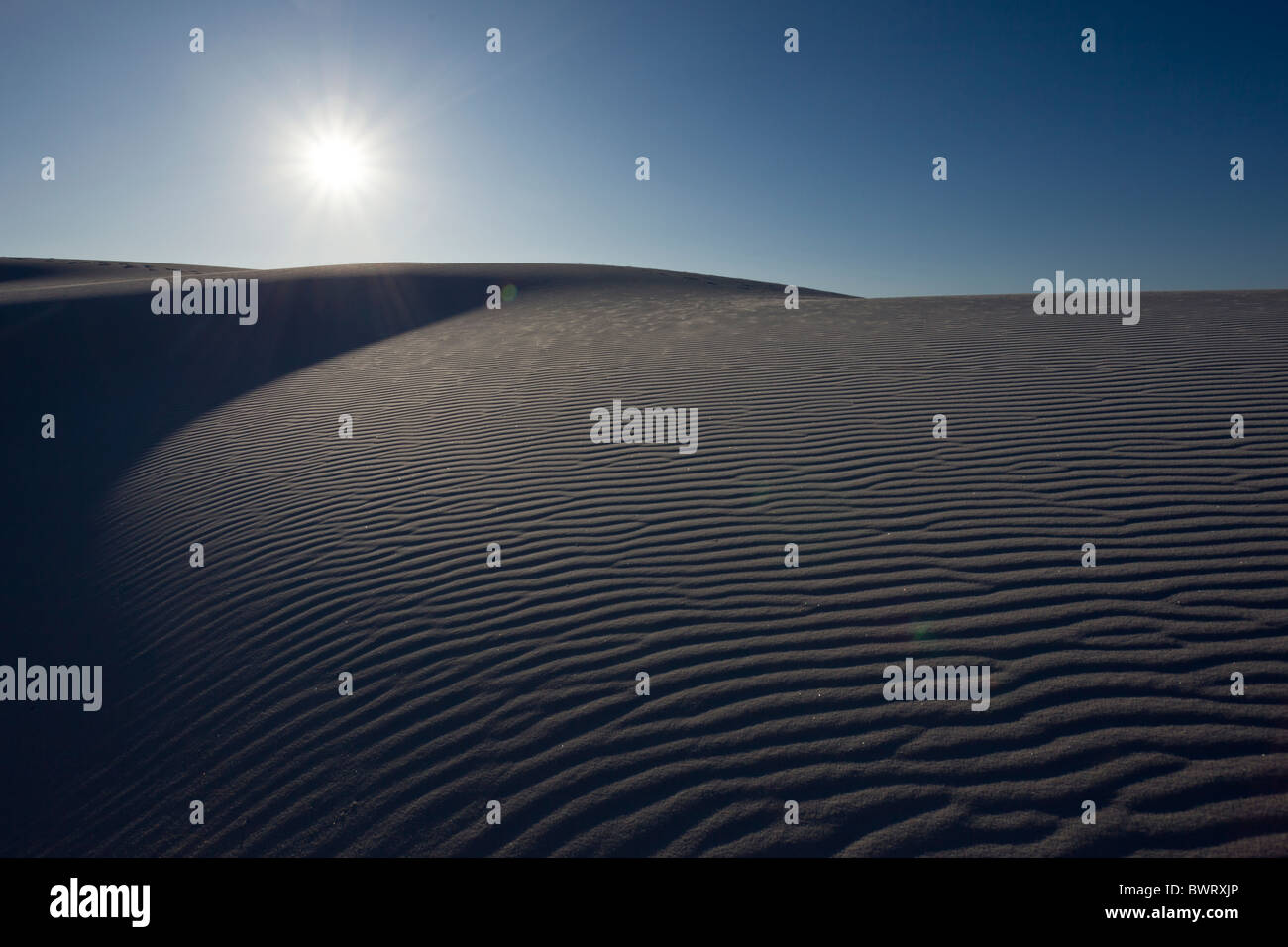 Sunburst and sand pattern in the white gypsum sand dunes of White Sands ...