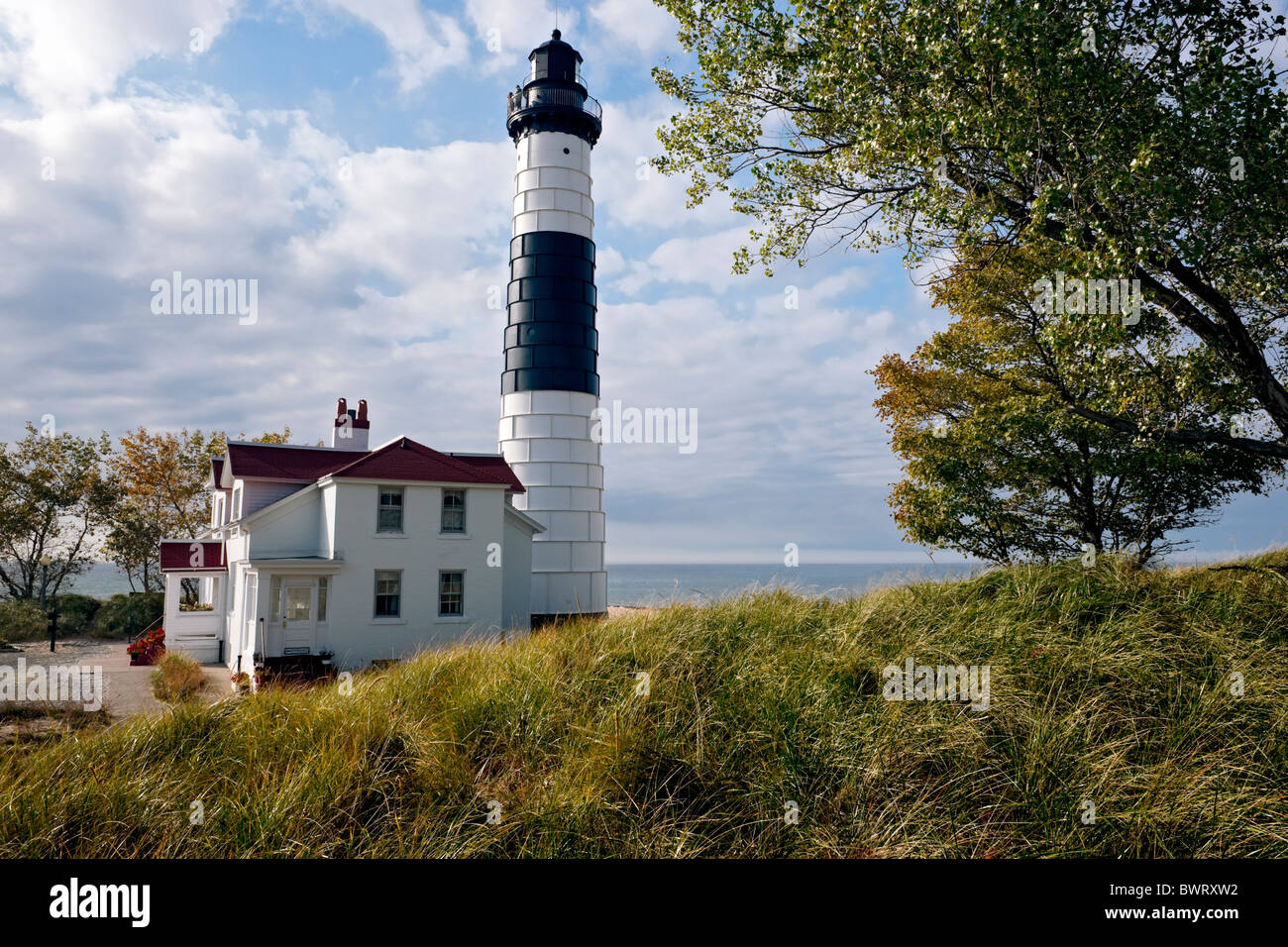 Beautiful clouds float by Michigan’s Big Sable Lighthouse (1867) and ...
