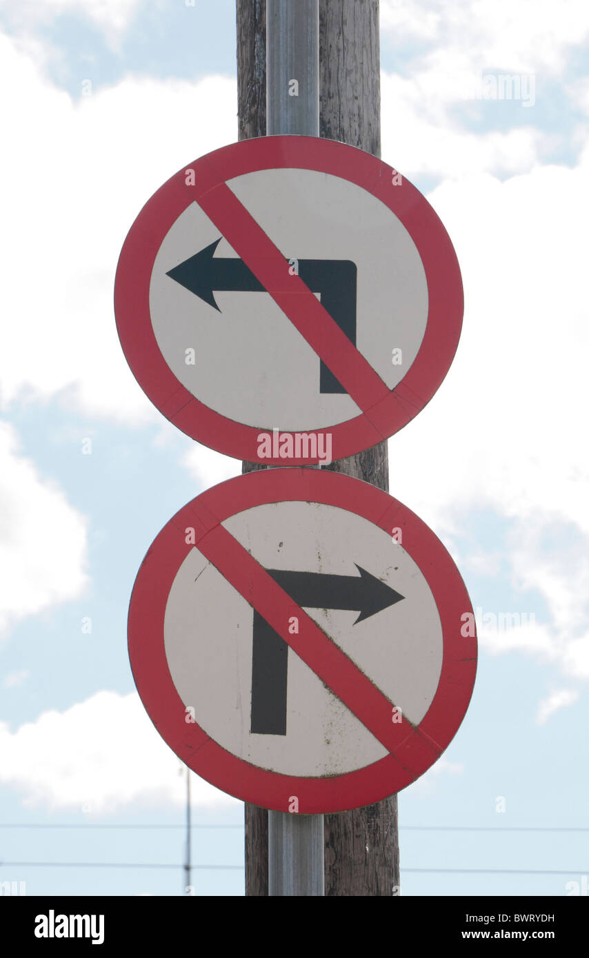 A confusing no left turn, and no right turn sign on a lamp post in ...