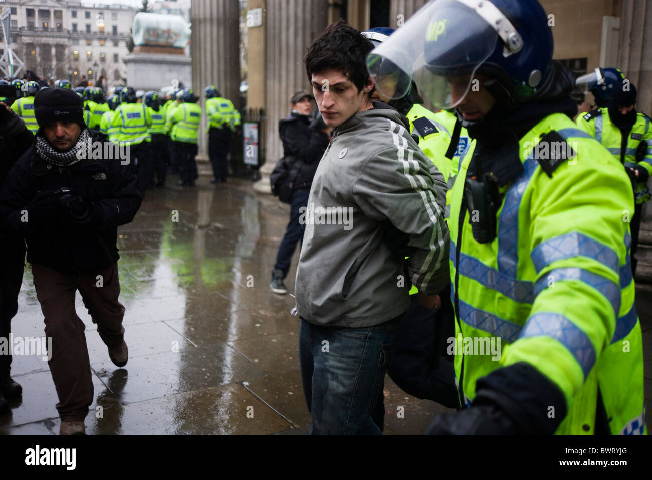 Young student is arrested for public disorder during protest against ...