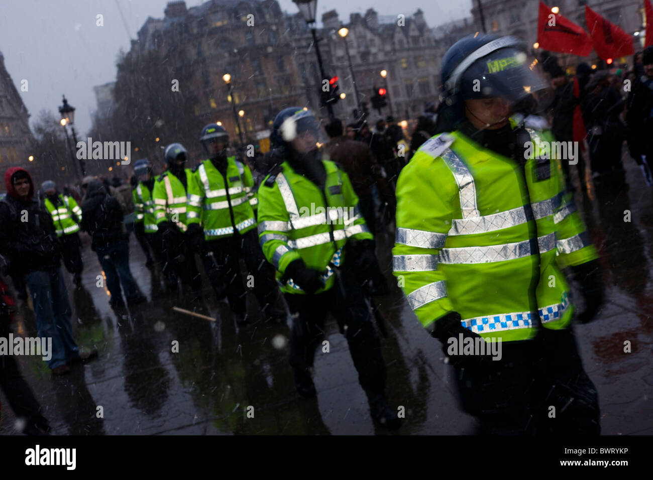 Met police riot officers form up during student protests in Trafalgar ...
