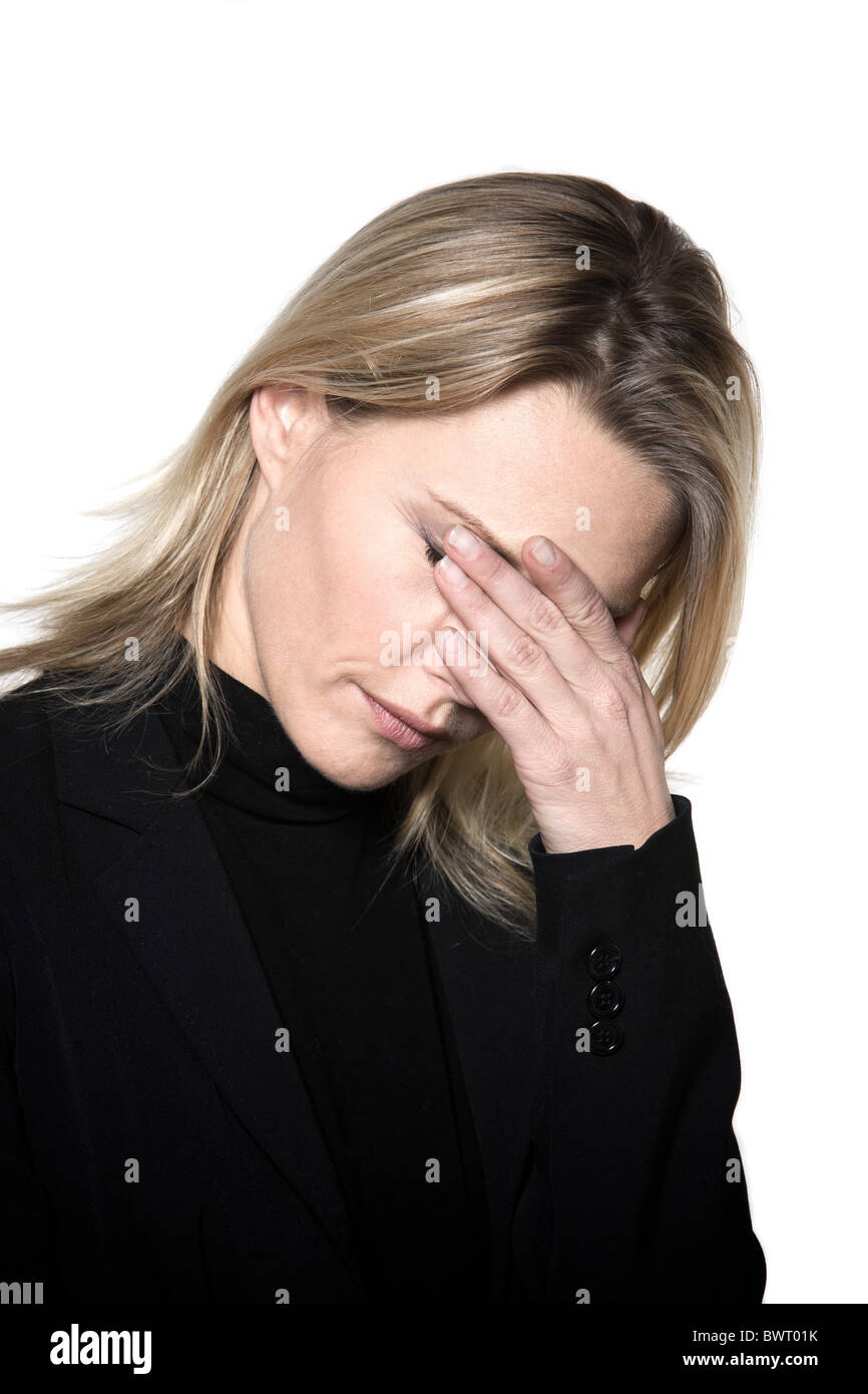 beautiful blond hair woman sad grief headache portrait on studio white ...