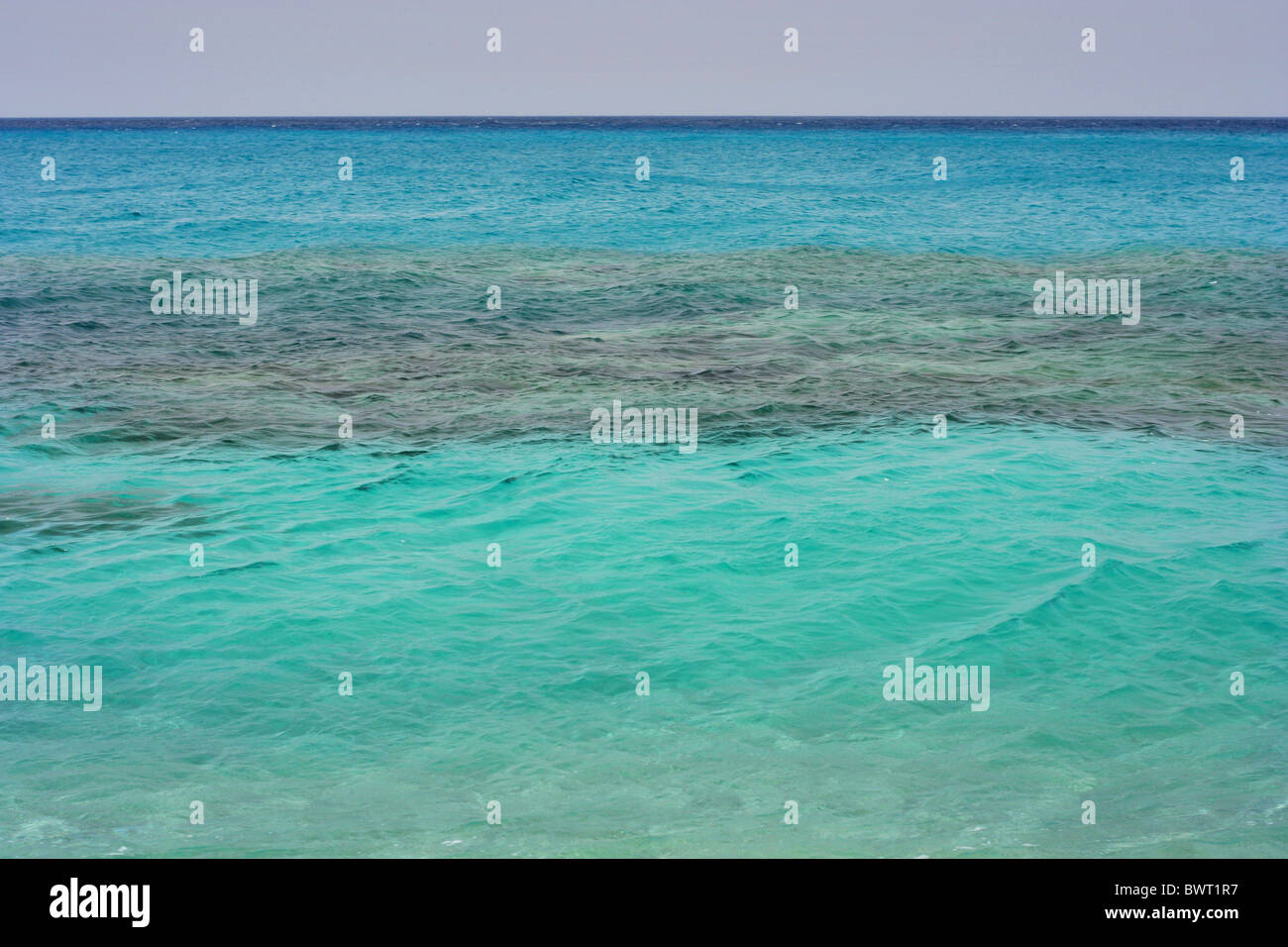 Clear blue water off a beach in Tropea, Italy Stock Photo - Alamy