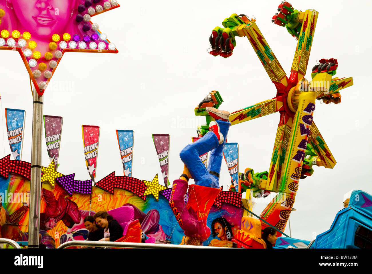 Amusement ride in sideshow alley Stock Photo - Alamy