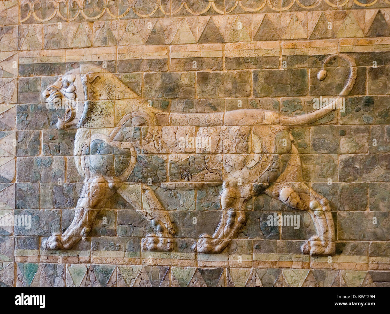 Lion Relief from the palace of Darius I, The Louvre, Paris Stock Photo ...