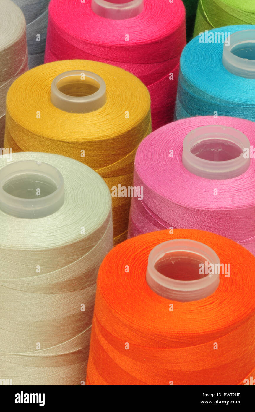 Group of multicolored sewing threads Stock Photo - Alamy