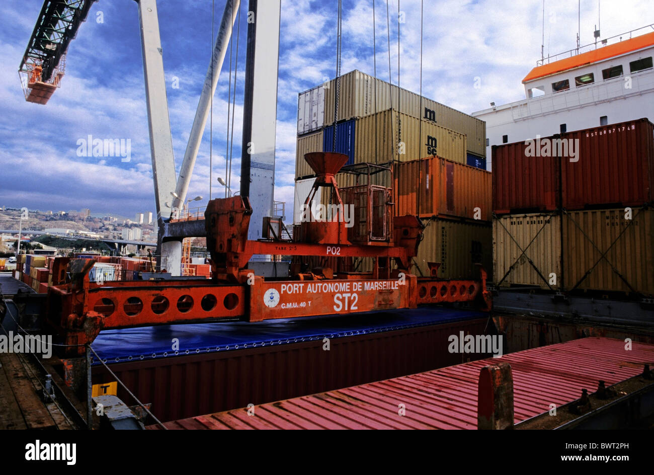 Containers being loaded on a cargo ship, Marseille Port, France Stock ...
