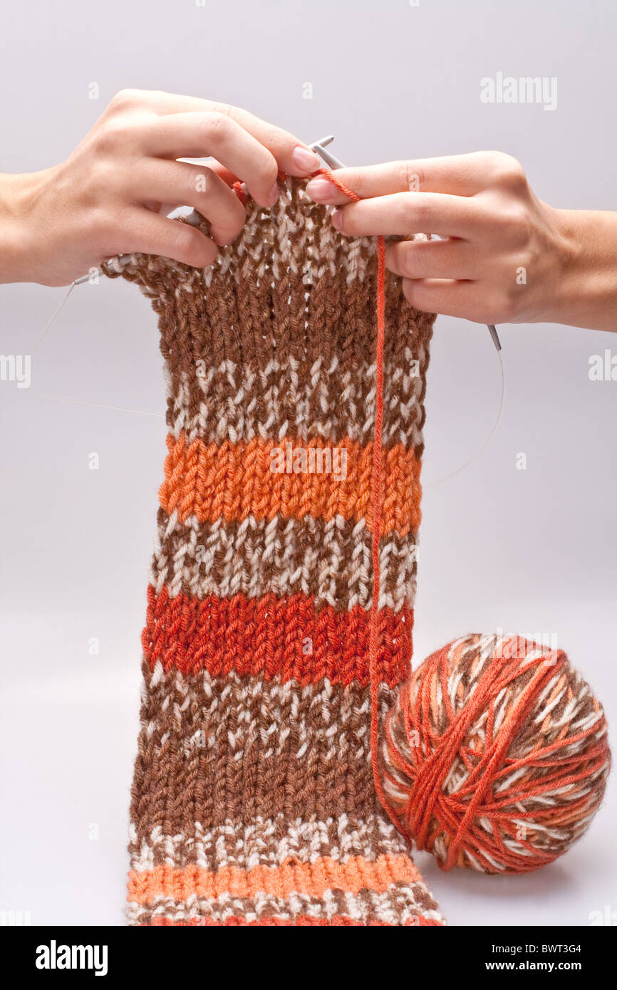 woman's hand knit knitting yarn and clothes Stock Photo - Alamy