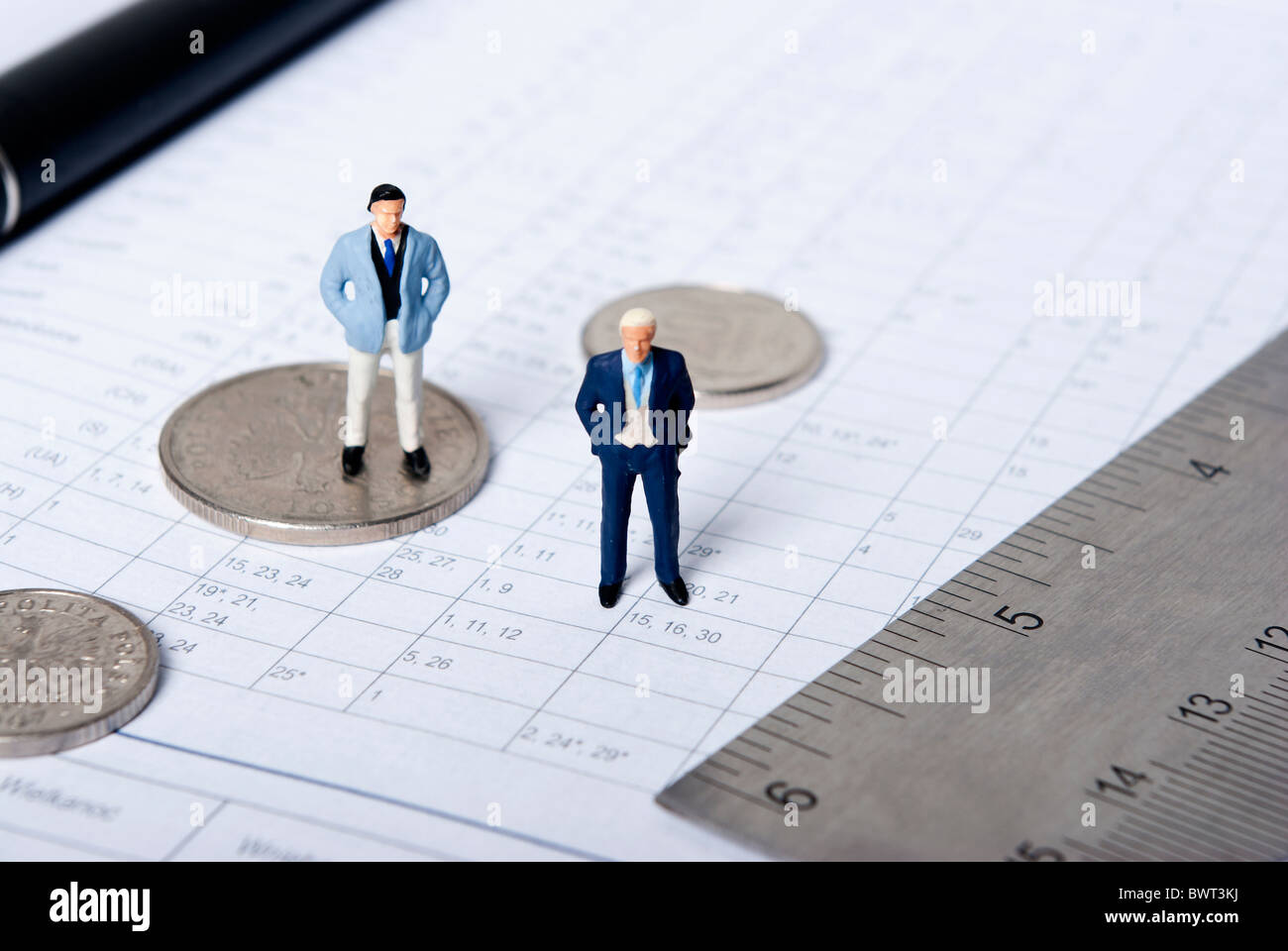 Group tiny figurine man hi-res stock photography and images - Alamy