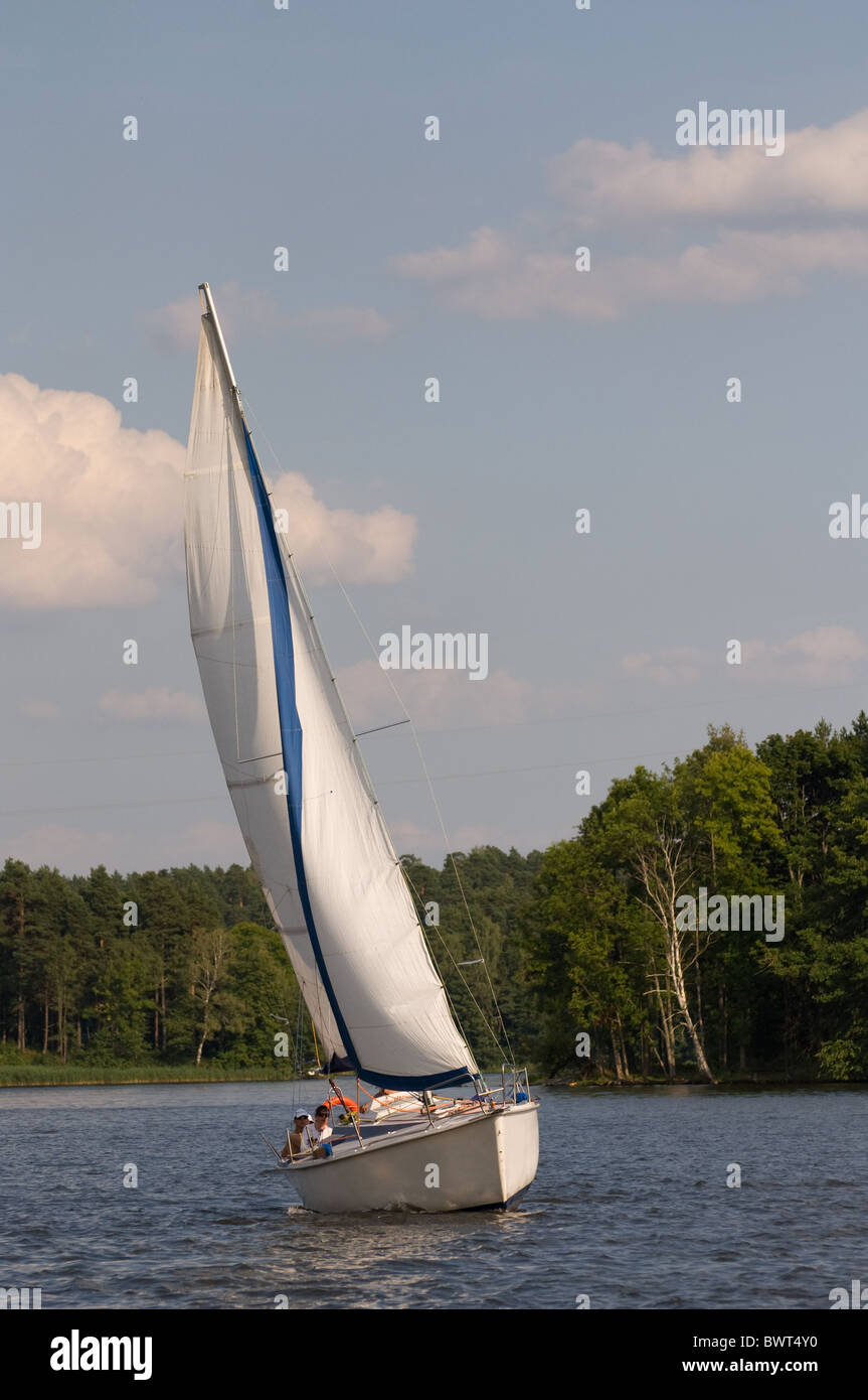 White boat sailing view Stock Photo - Alamy