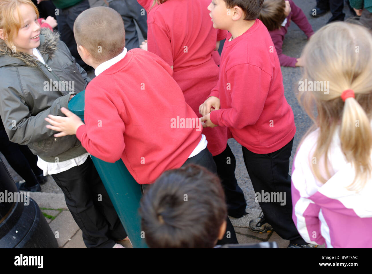 Children playing school playground uk hi-res stock photography and ...