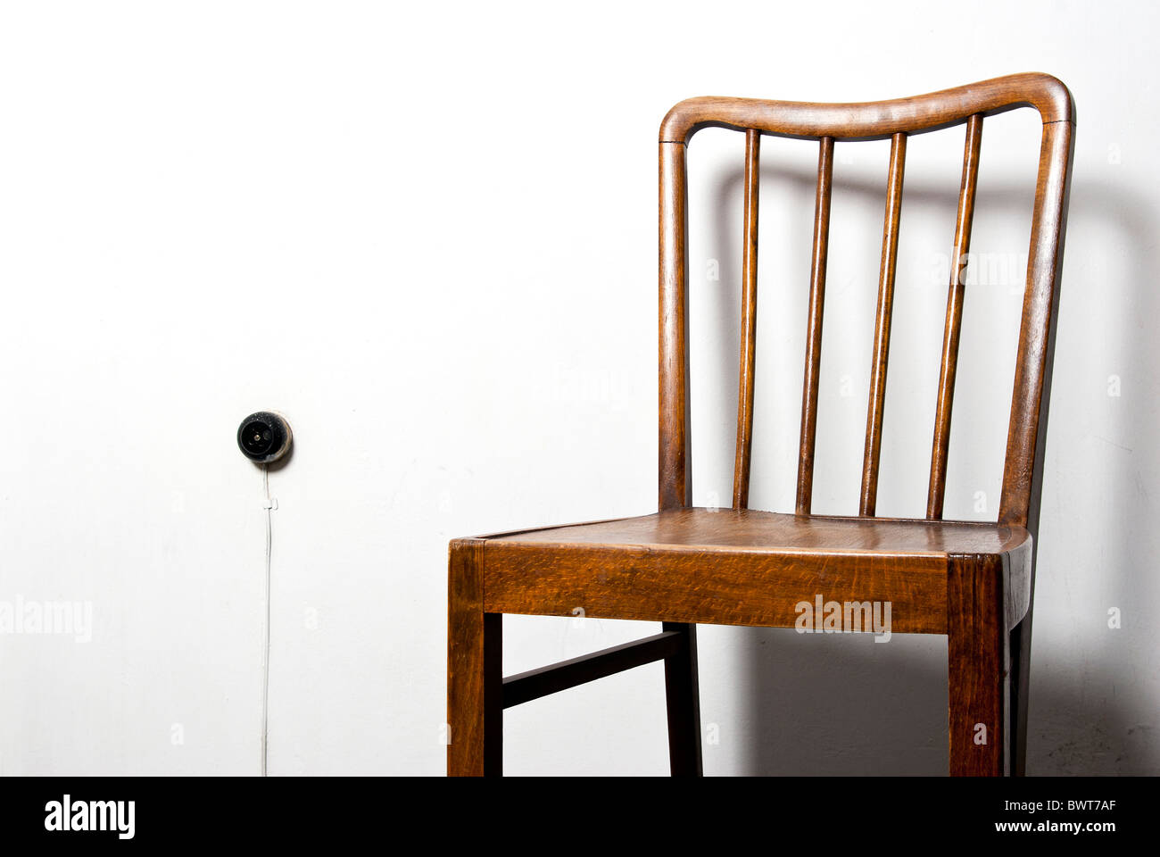 chair and plug on the wall Stock Photo - Alamy