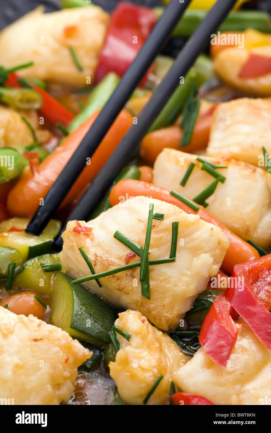 Thai Fish with Vegetable as closeup in a wok Stock Photo - Alamy