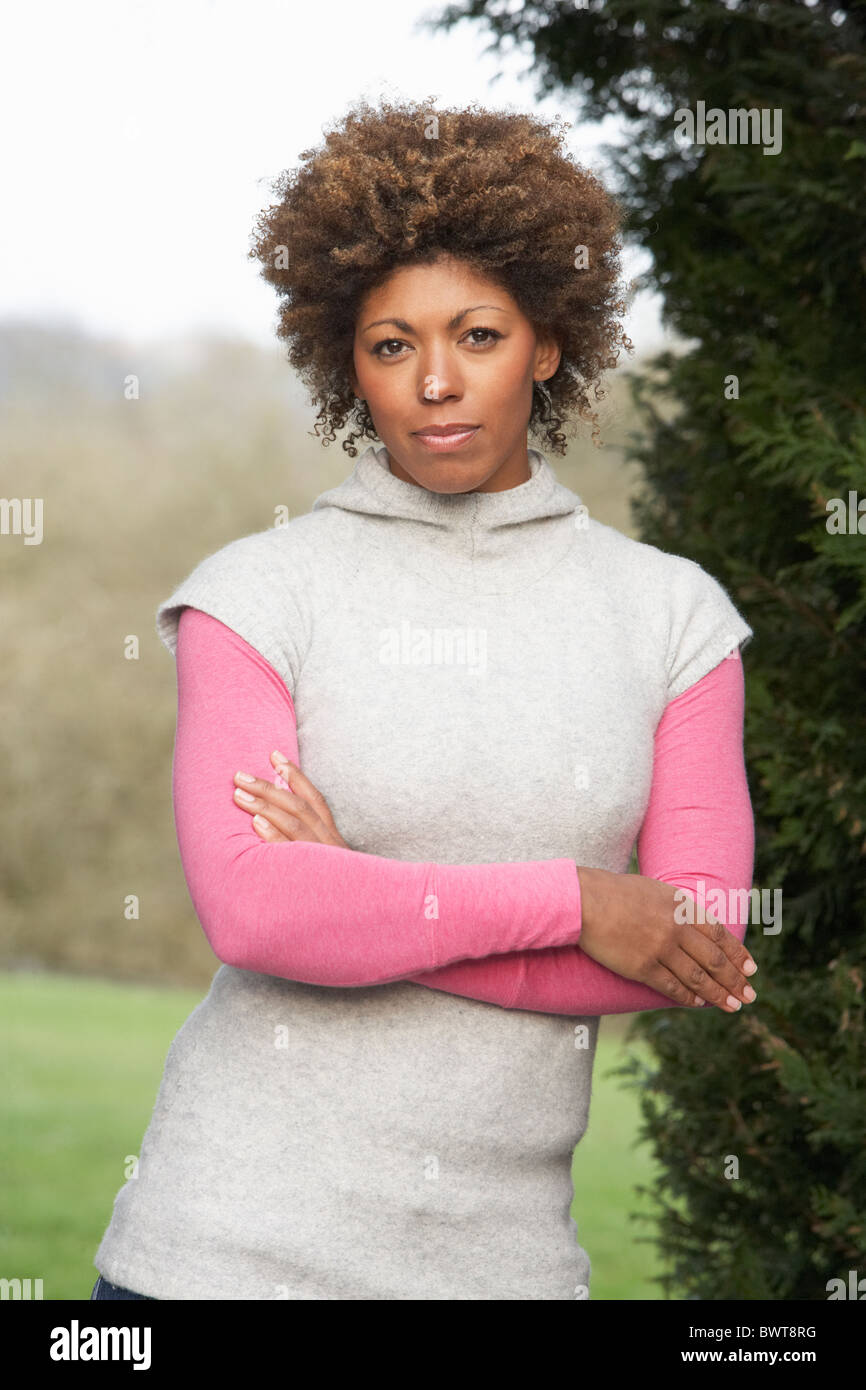 Portrait Of Beautiful Woman In Garden Stock Photo - Alamy