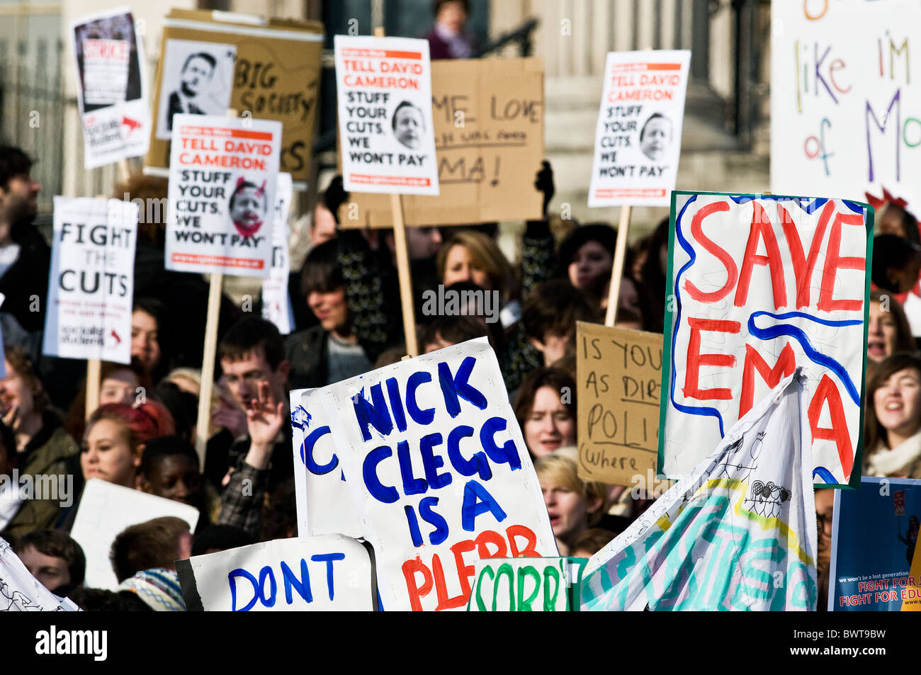 Placards at a student demonstration in London Stock Photo - Alamy