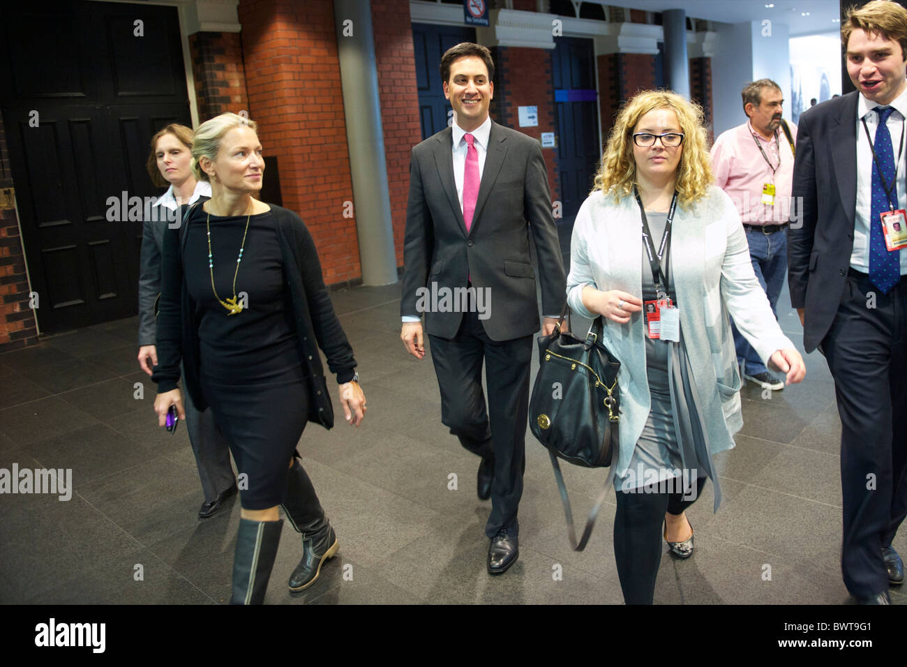 Newly elected Labour leader Ed Miliband departs the auditorium at the ...