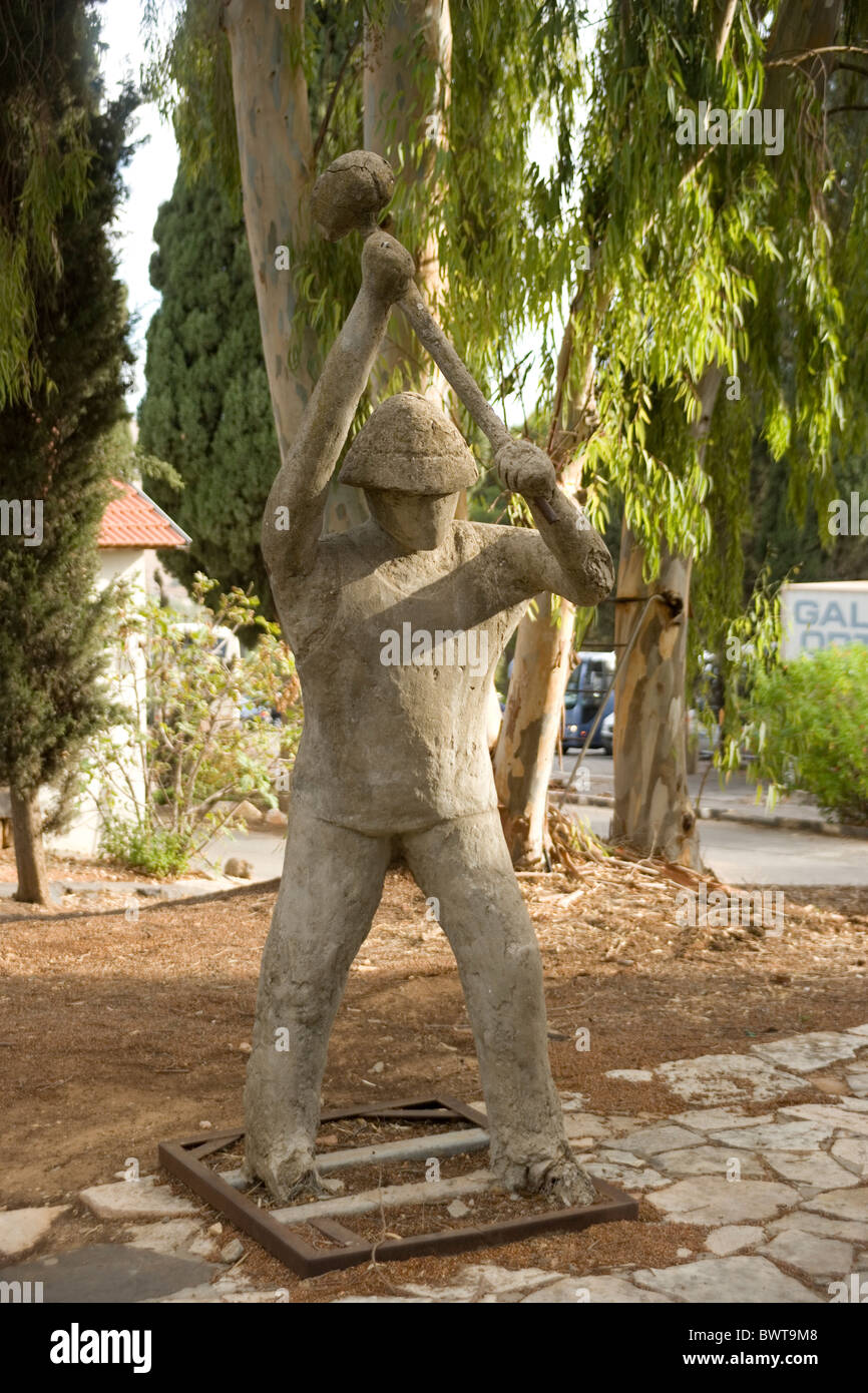 Statue in front of The Founders House in the kibbutz Kfar Giladi in ...