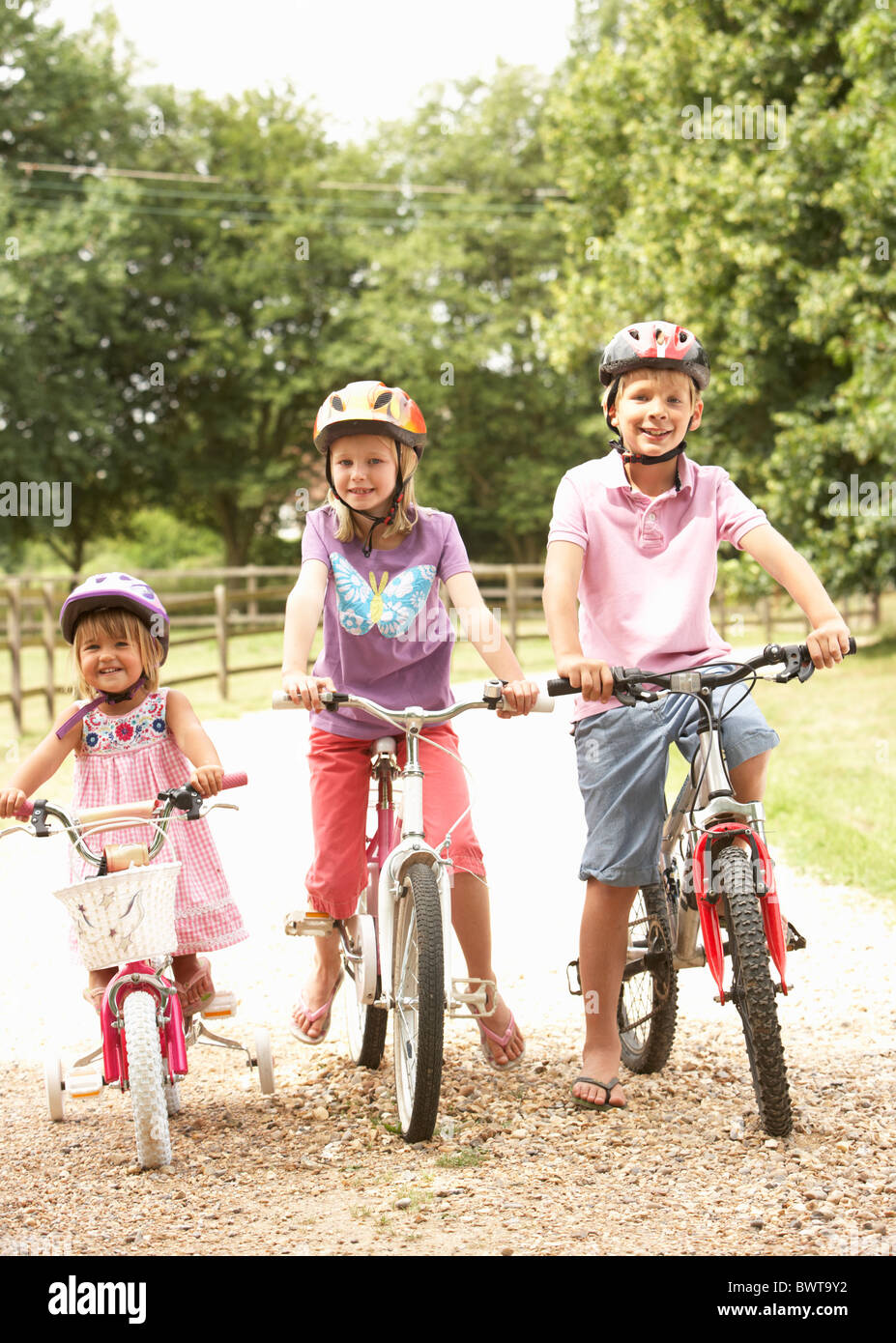 Children In Countryside Wearing Safety Helmets Stock Photo - Alamy