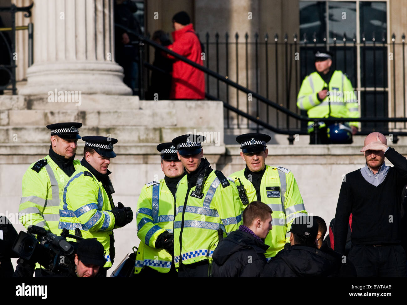 Metropolitan Police officers watching a student demonstration Stock ...
