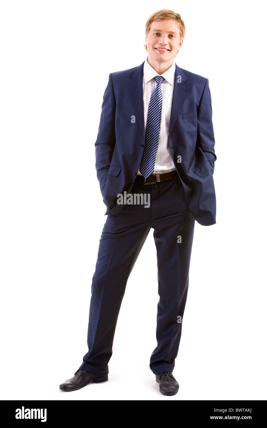 Vertical image of successful man standing in studio Stock Photo - Alamy
