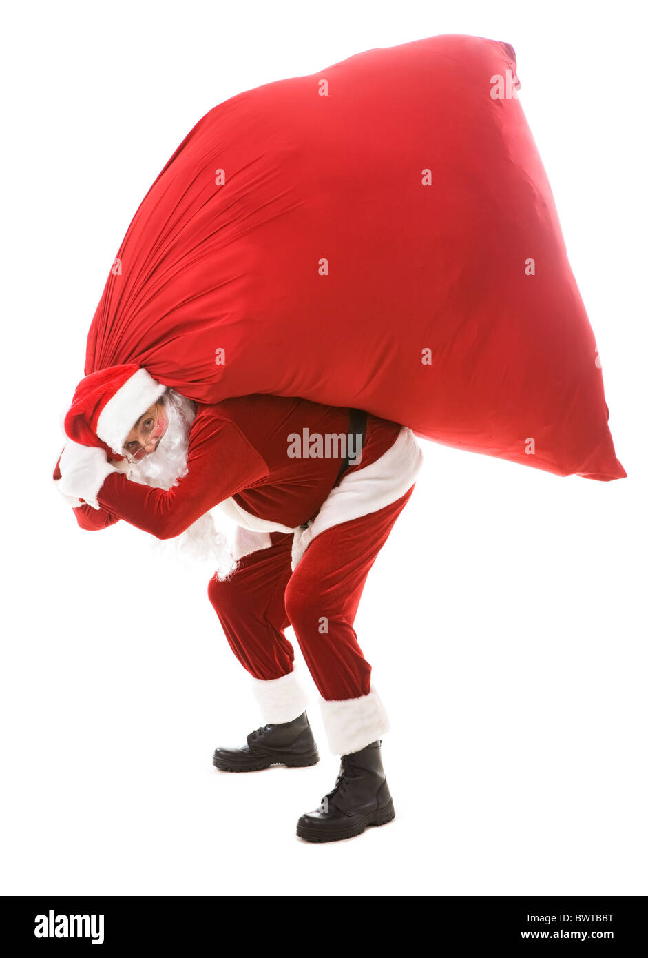 Portrait of strong Santa Claus holding big red sack with presents Stock ...