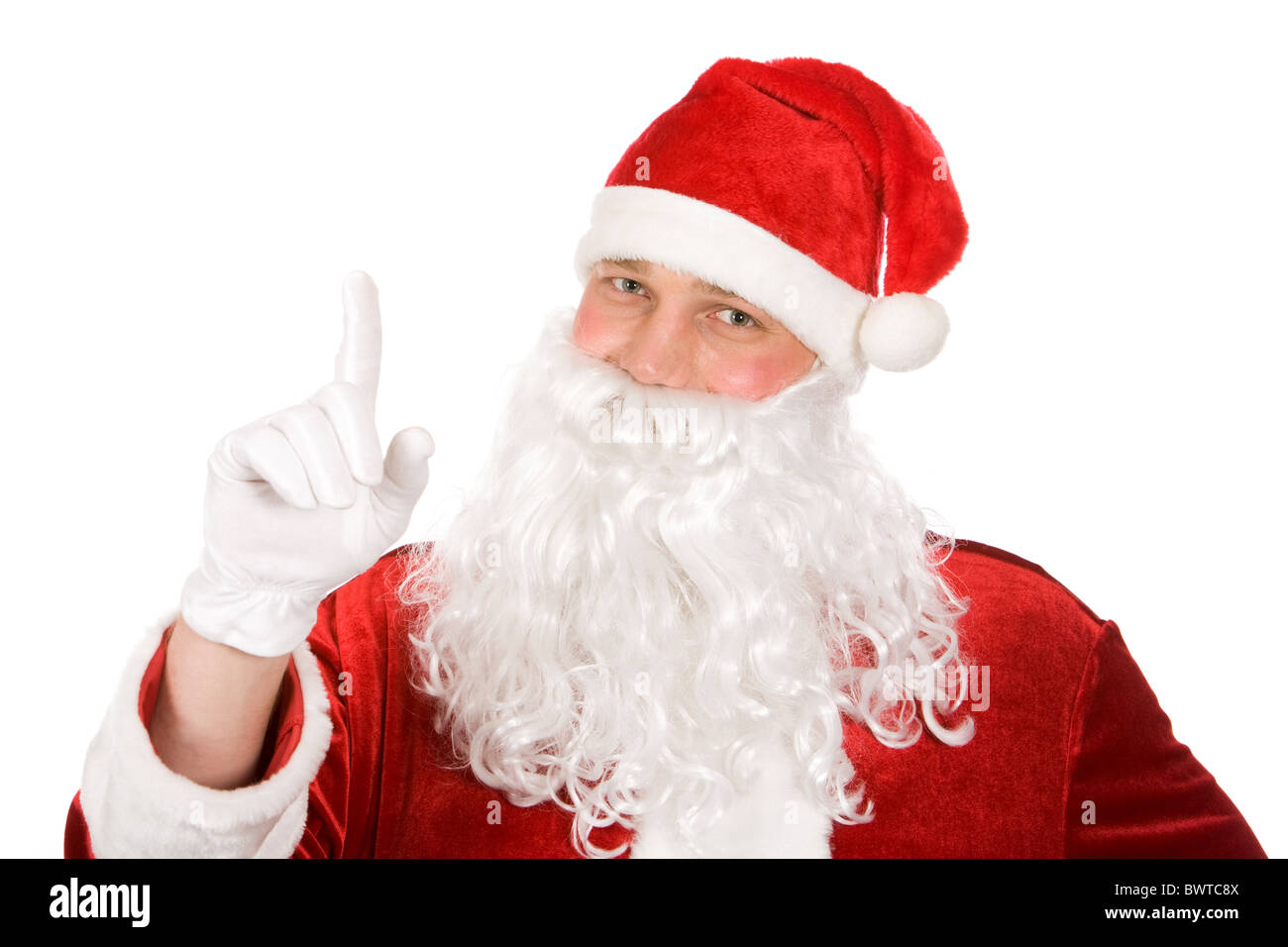 Photo of happy Santa Claus keeping his forefinger stuck upwards Stock ...