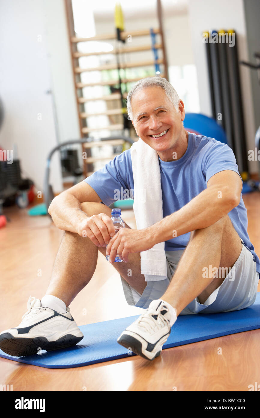 Man Resting After Exercises In Gym Stock Photo - Alamy