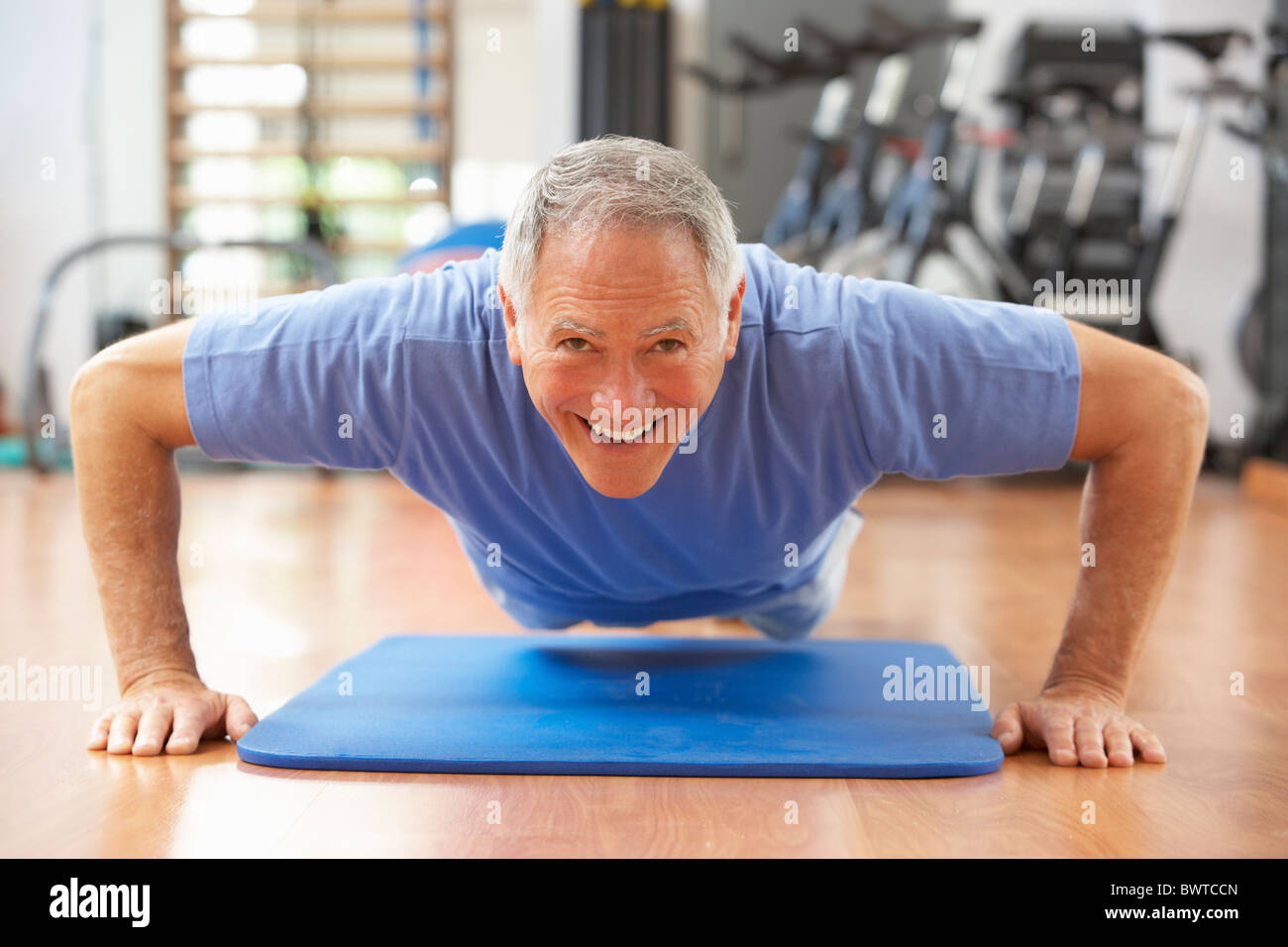 Senior Man Doing Press Ups In Gym Stock Photo - Alamy