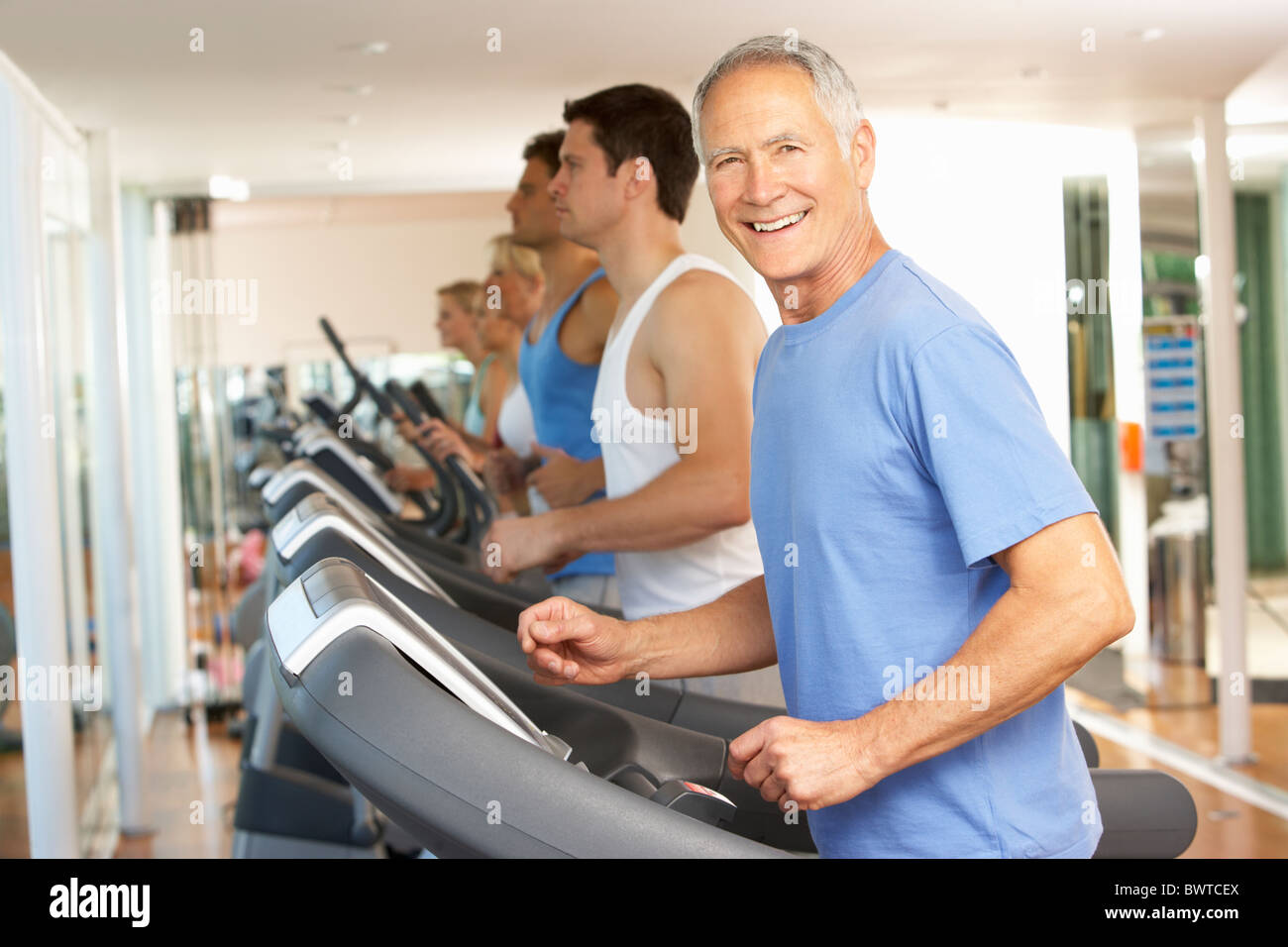 Older man running treadmill hi-res stock photography and images - Alamy